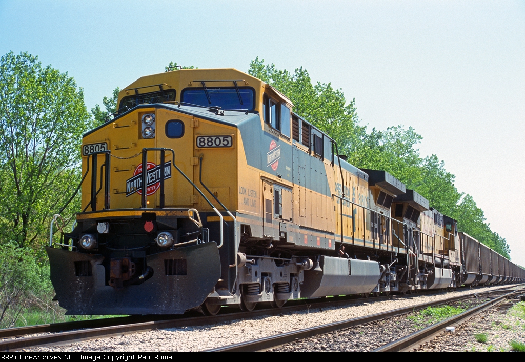 C&NW 8805, GE AC4400W, leads an empty Wheatfield coal train on the Conrail